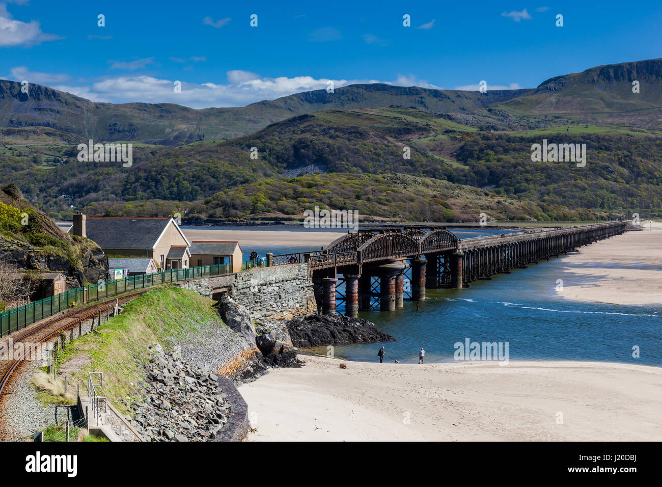 The Cambrian Coast railway line crosses the Mawddach Estuary near ...