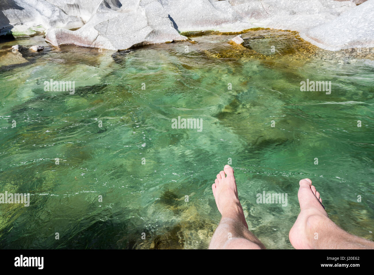 Dipping foot in water hi-res stock photography and images - Alamy