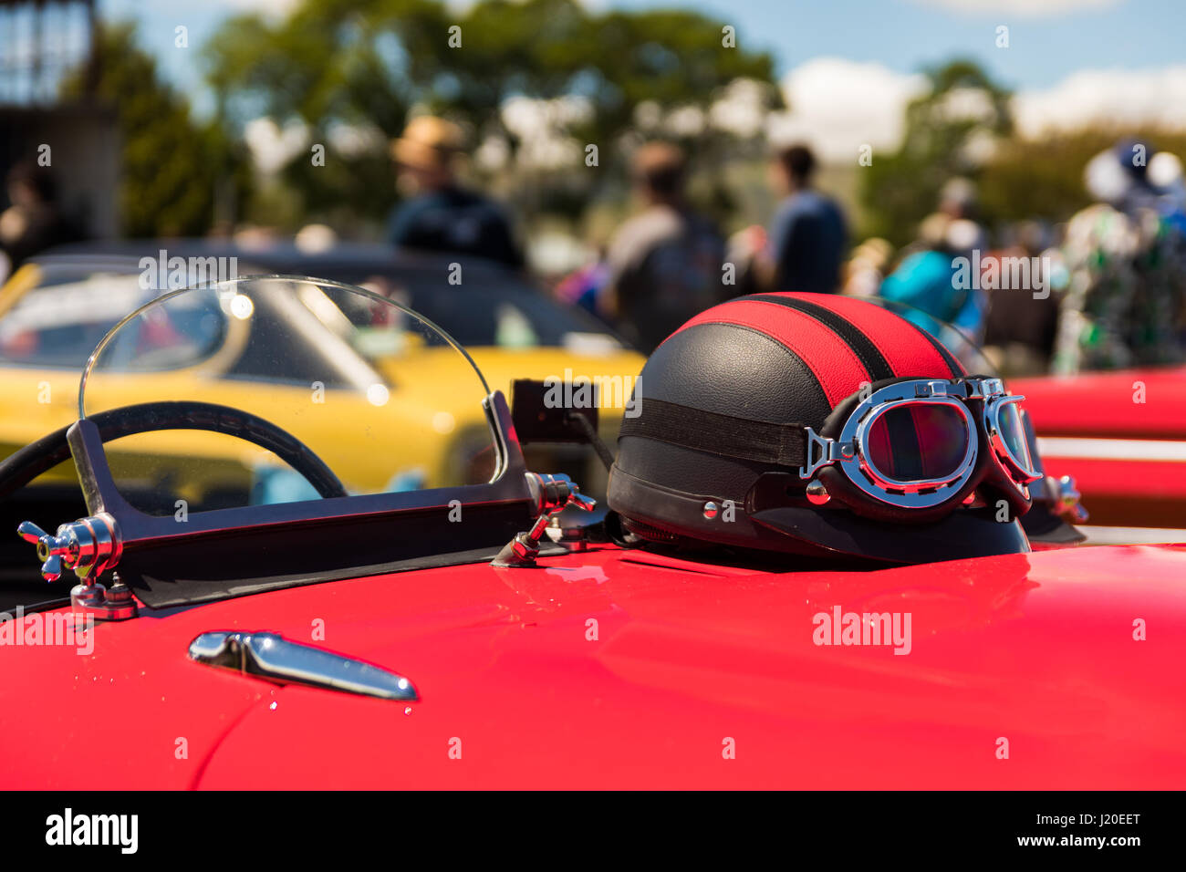 Black and red car helmet for a red car Stock Photo - Alamy