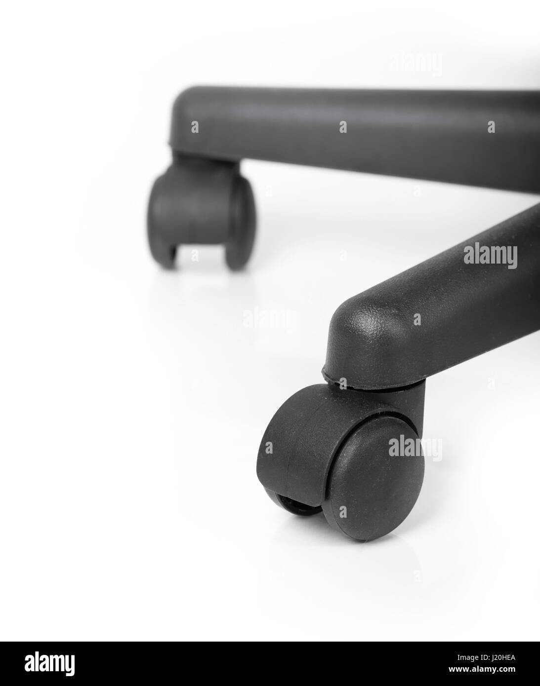 Wheels of chair isolated Stock Photo - Alamy