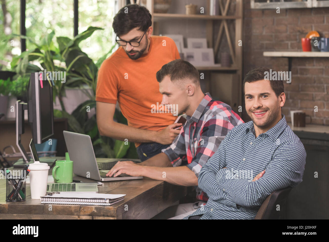 Young men programmers working together in the office Stock Photo - Alamy Young men programmers working together in the office Stock Photo - Alamy