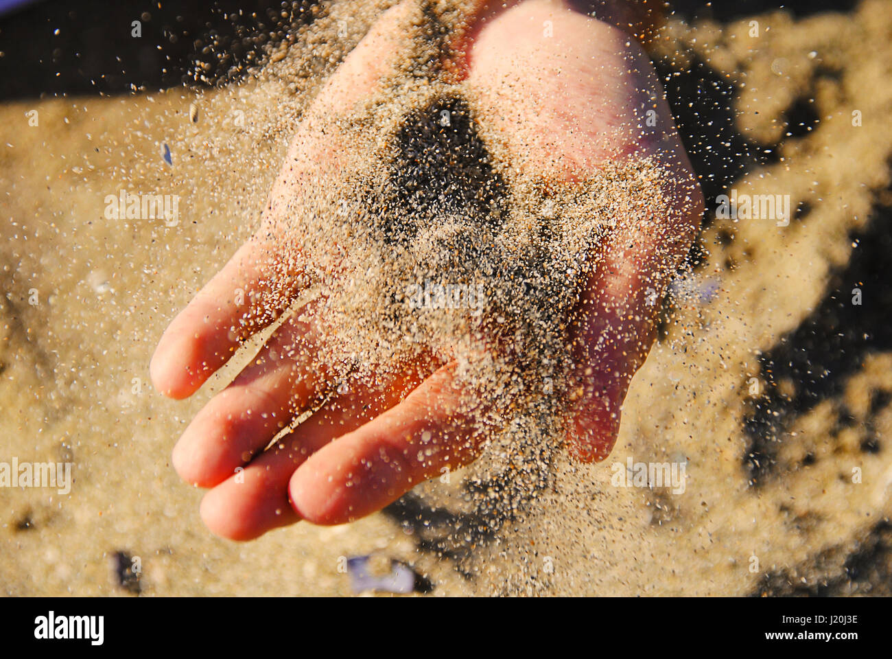 Throwing up sand hi-res stock photography and images - Alamy