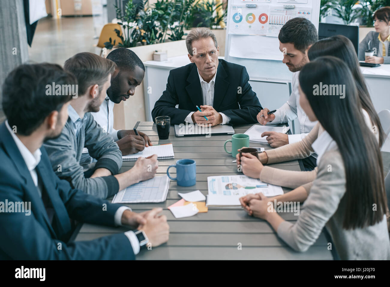 Group of people business meeting team work concept Stock Photo - Alamy