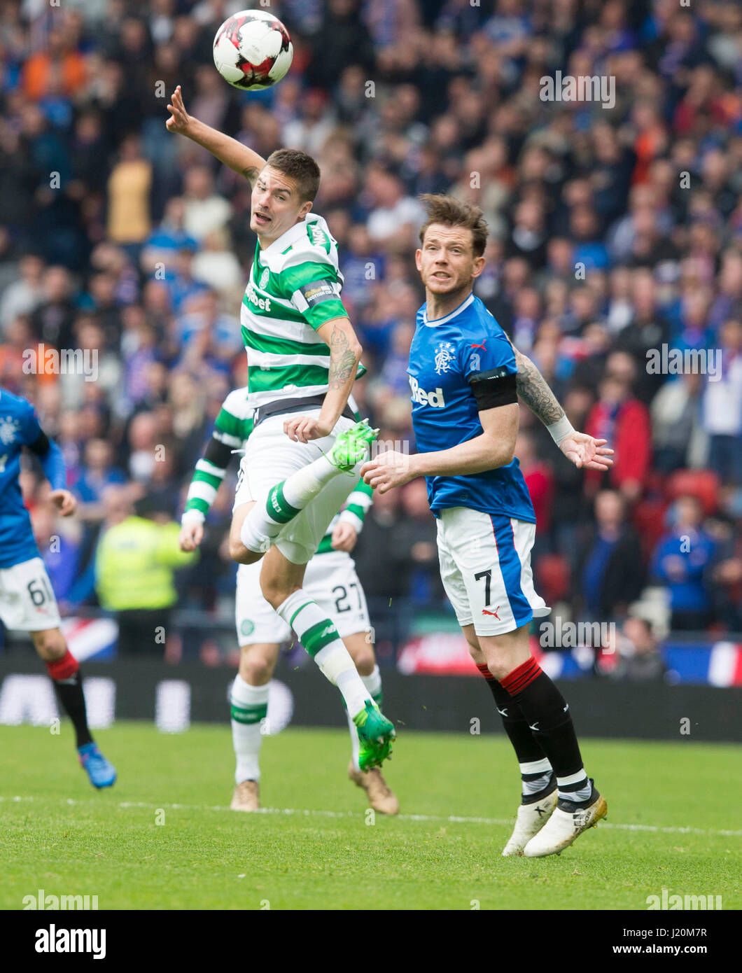 Celtic's Mikael Lustic (left) and Rangers' Joe Garner during the ...