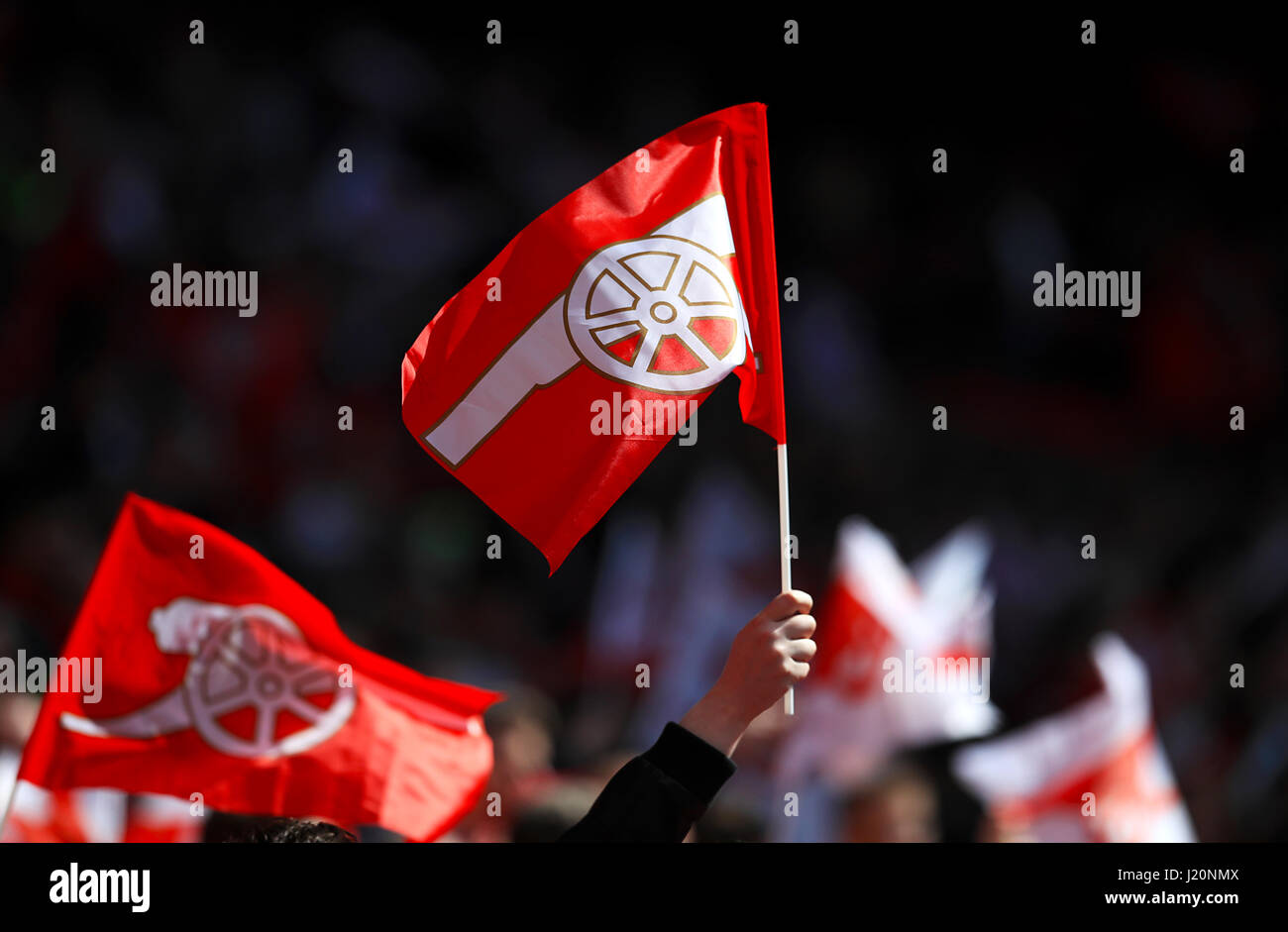Arsenal fans wave flags in the stands prior to the Emirates FA Cup ...