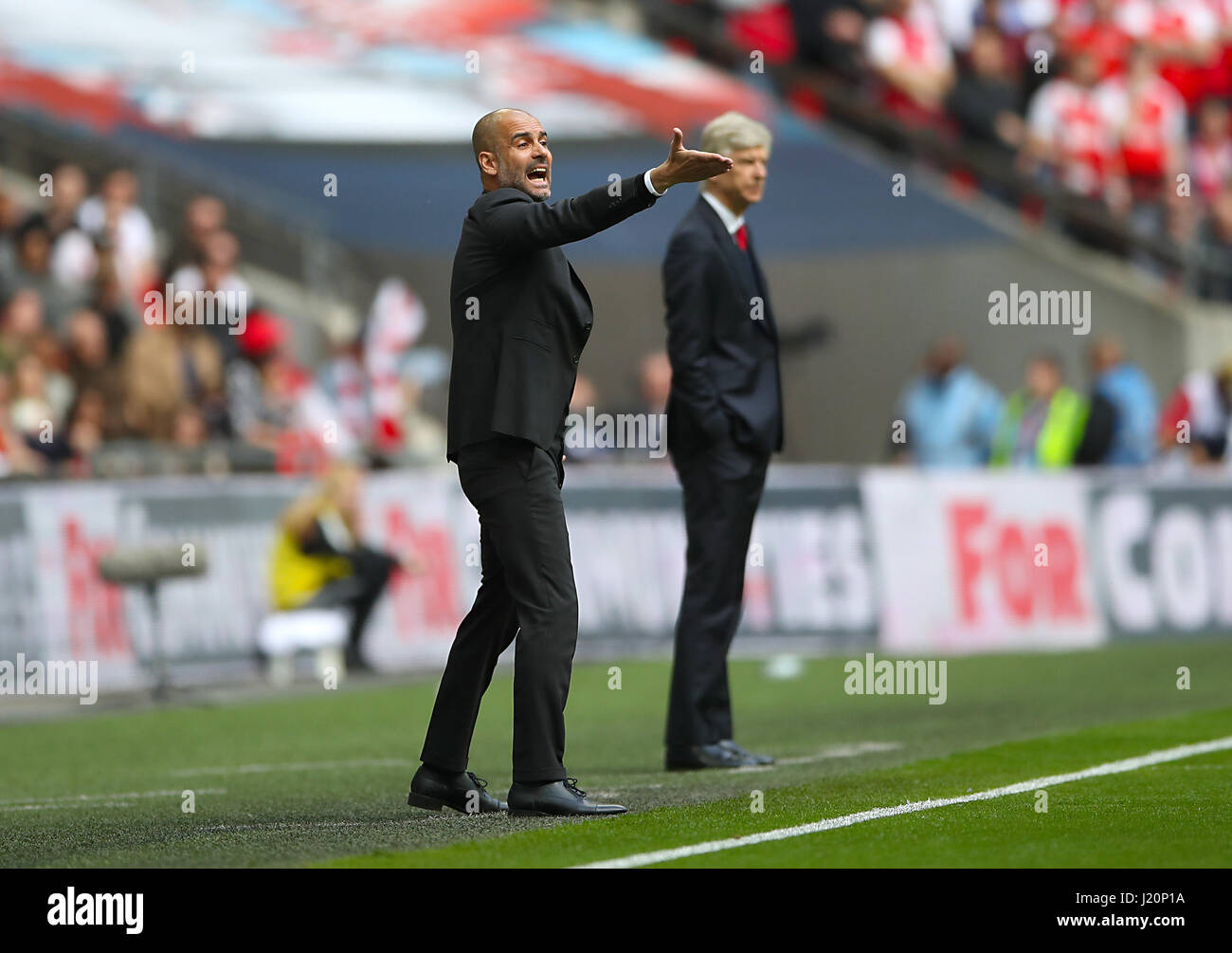 Manchester City manager Pep Guardiola gestures on the touchline during ...