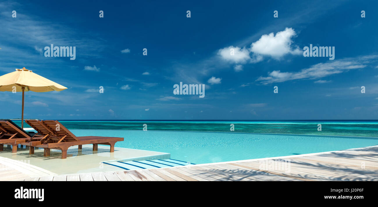 Infinity Pool Panorama on the maldives Stock Photo - Alamy