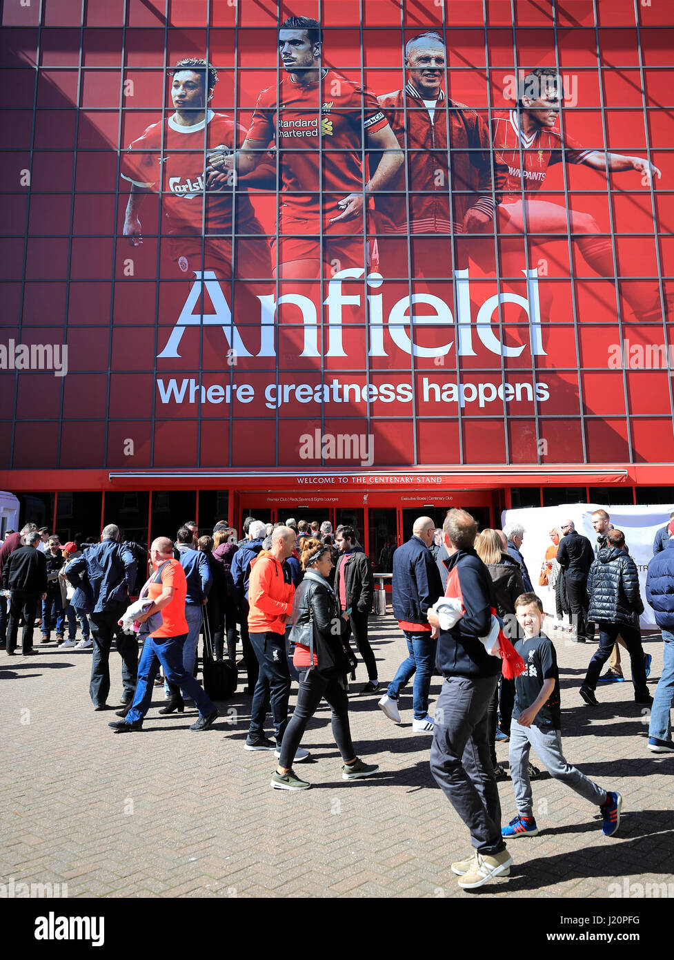 Fans arrive outside Anfield, Liverpool Stock Photo - Alamy