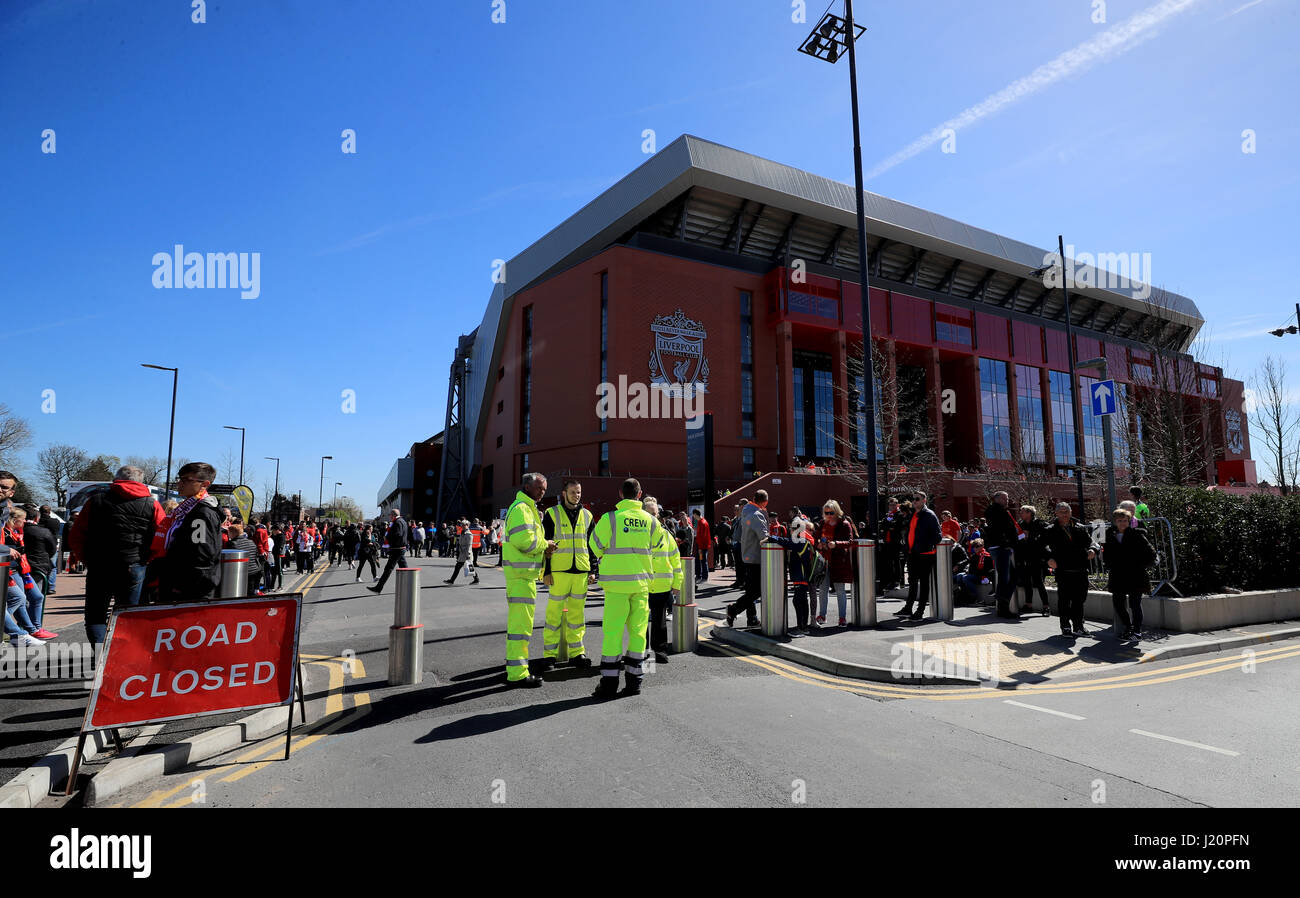 Fans enjoy the sunshine outside Anfield, Liverpool Stock Photo - Alamy