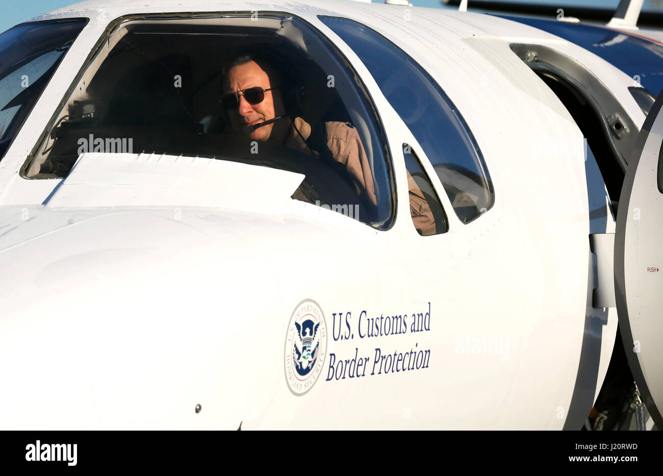 A U.S. Customs and Border Protection pilot prepares to take off from ...