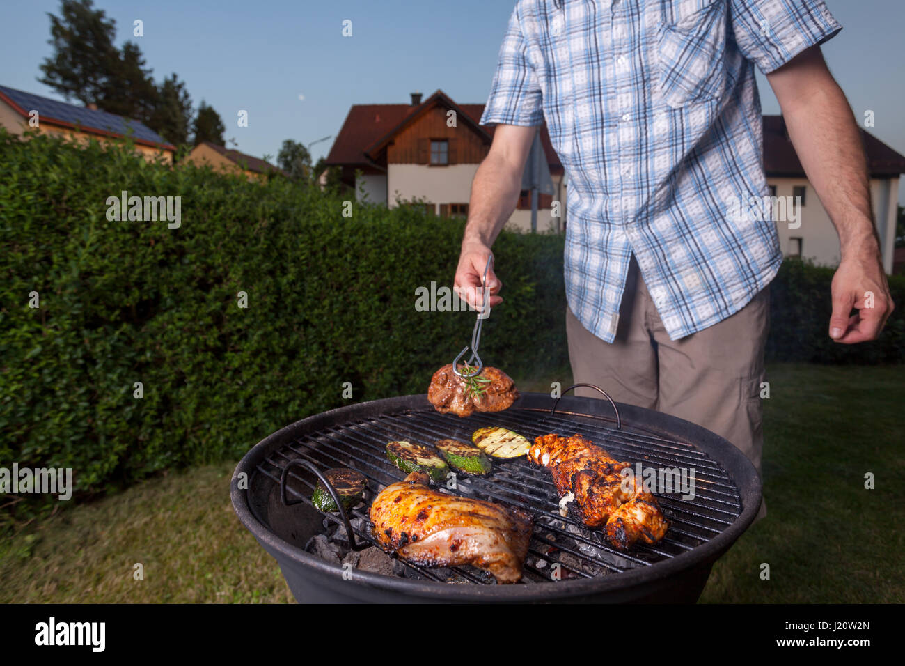 grill cooking out in the backyard Stock Photo - Alamy
