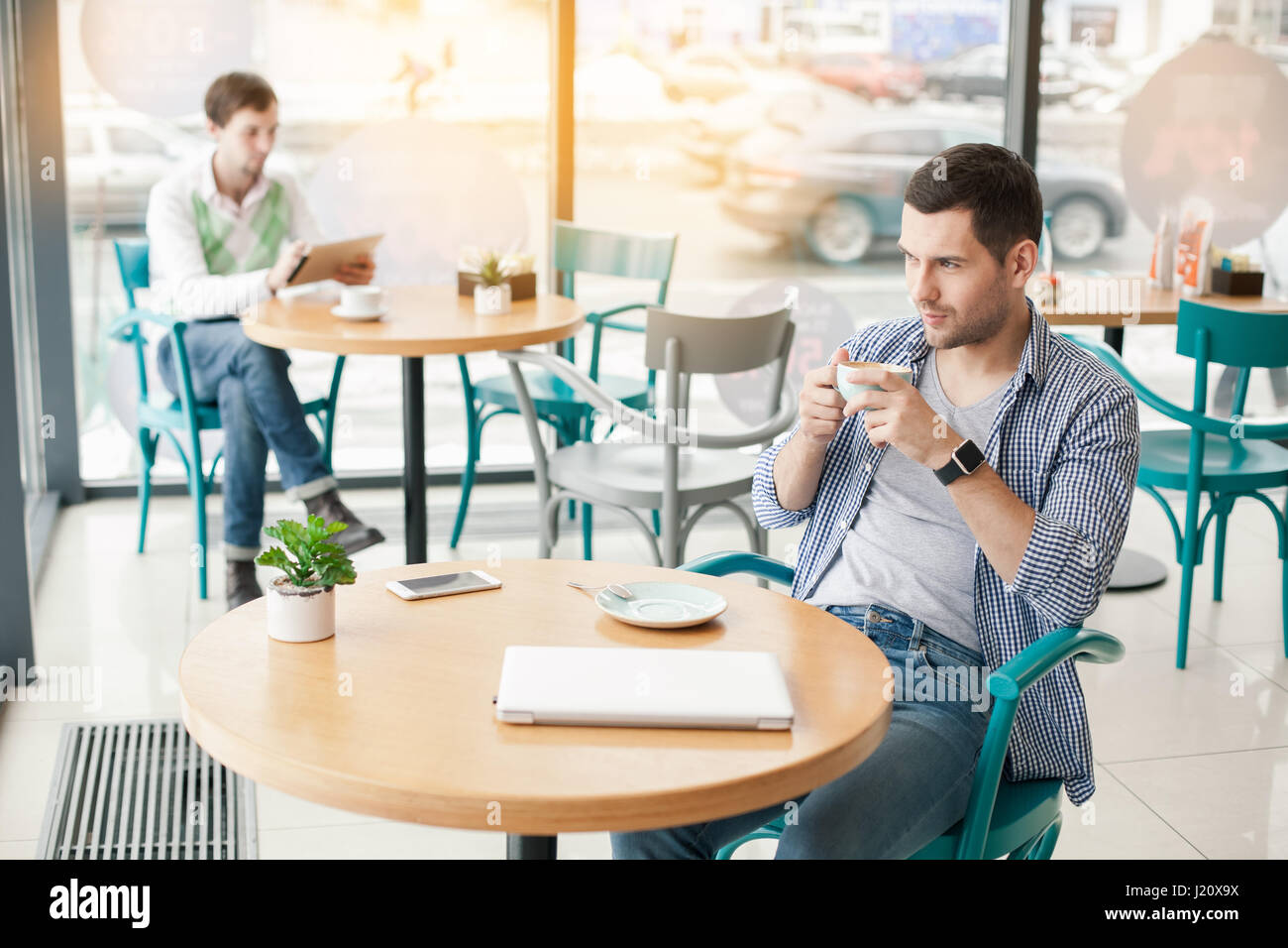 Young stylish man in cafe Stock Photo - Alamy