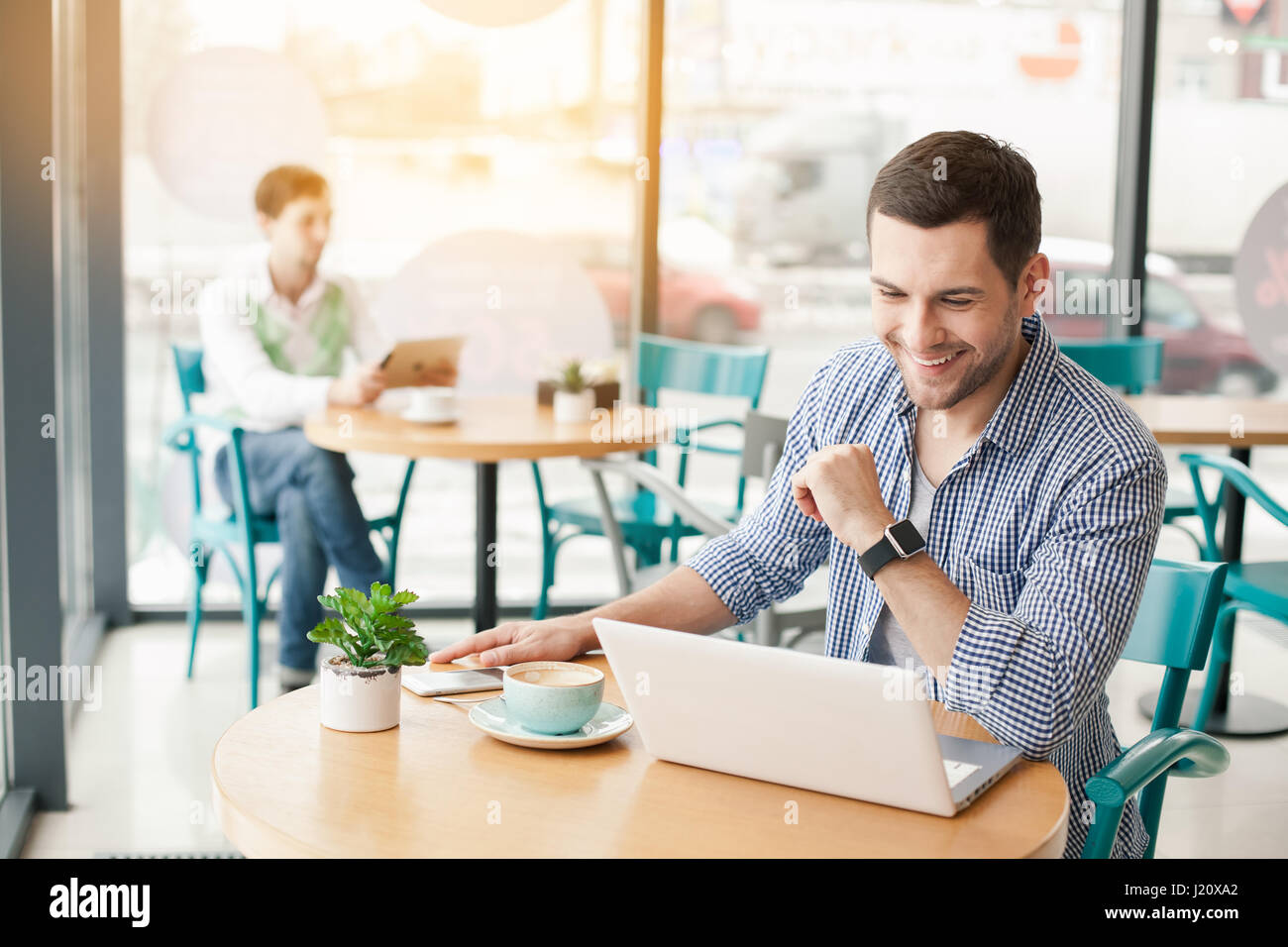 Young stylish man in cafe Stock Photo - Alamy