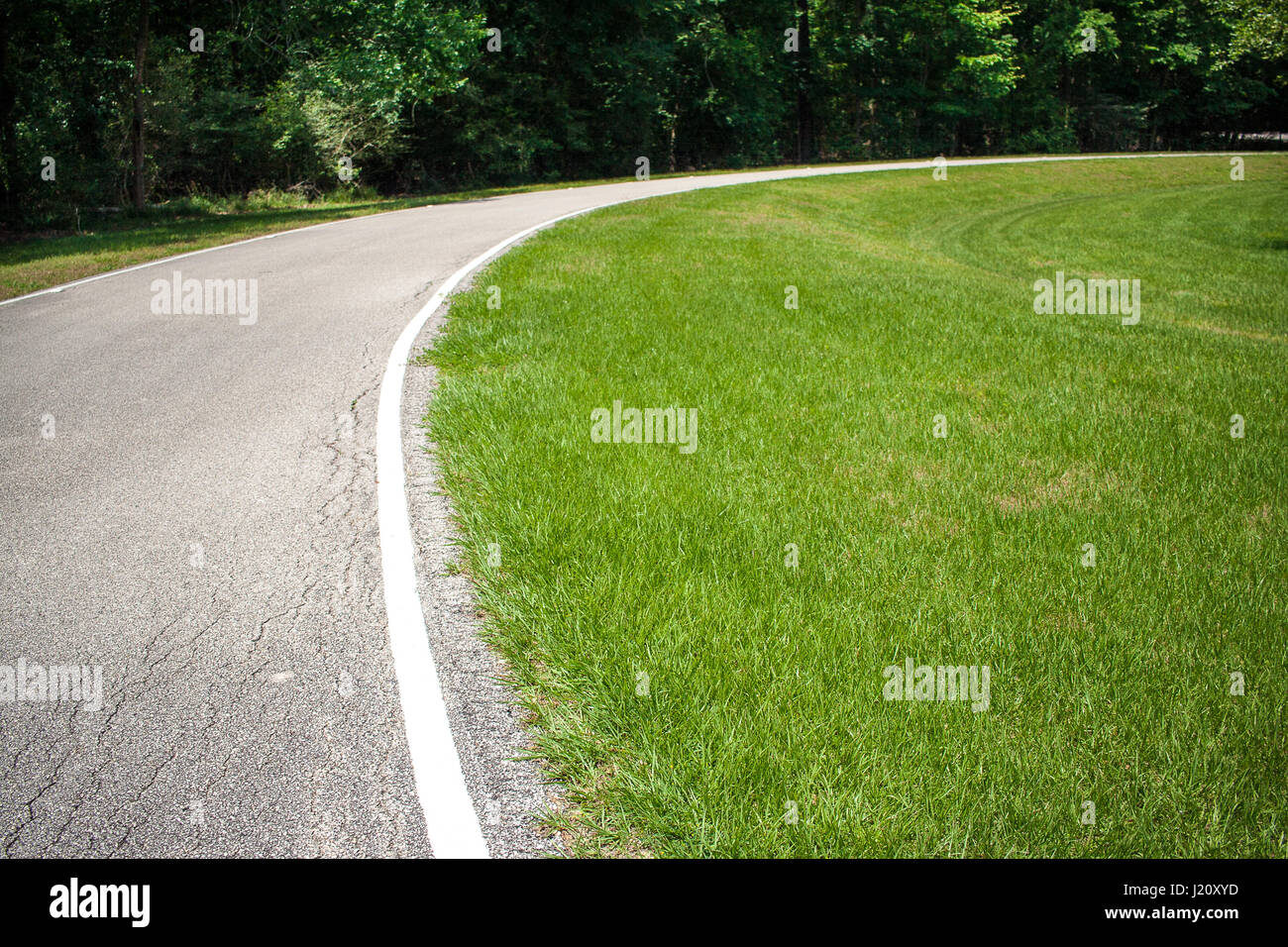 A curved road or bike path Stock Photo - Alamy