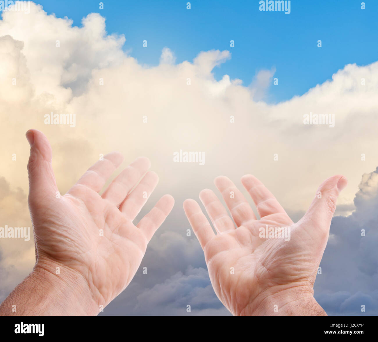 Hands reaching for the sky Stock Photo - Alamy