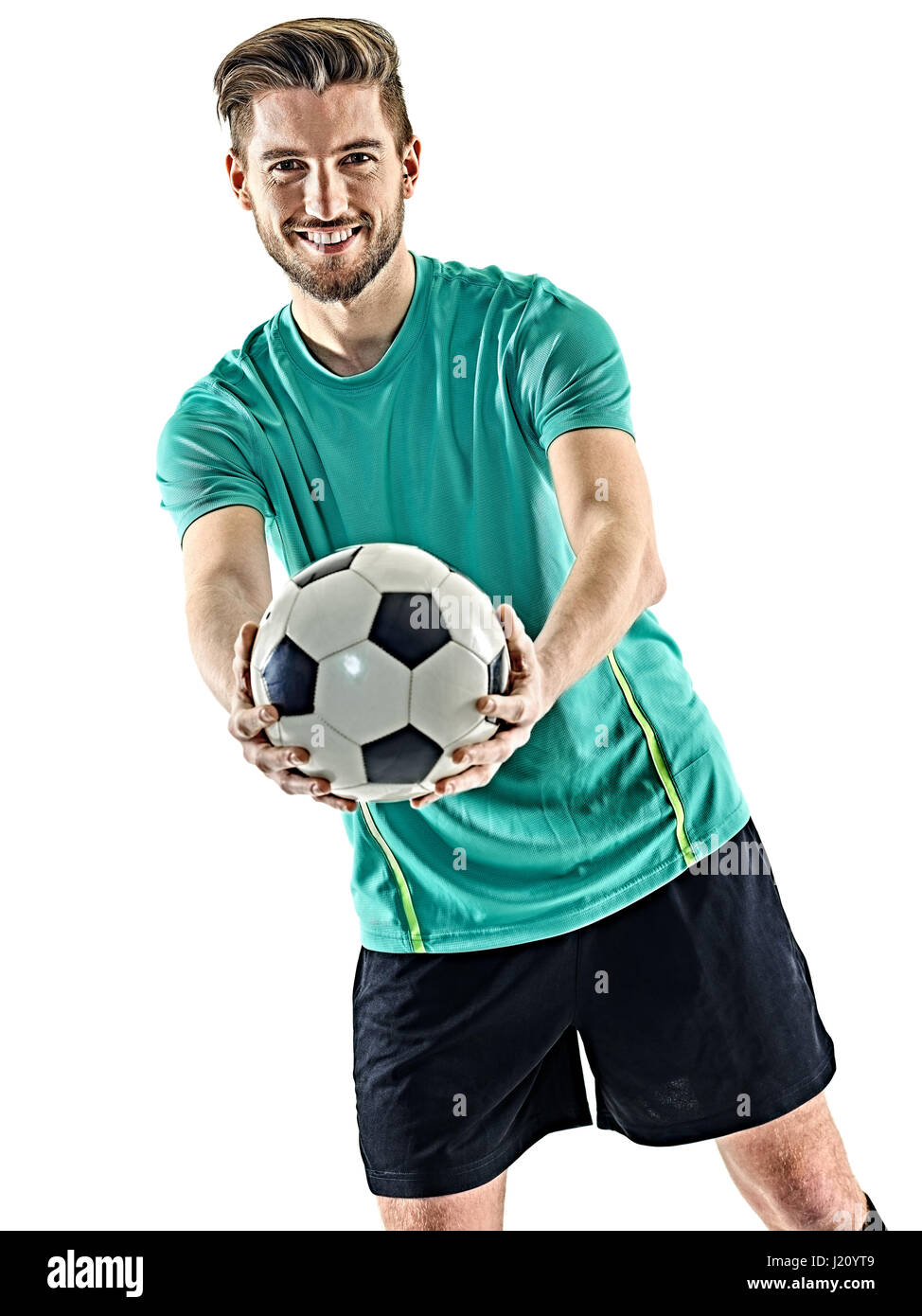 one caucasian soccer player man standing holding football isolated on ...