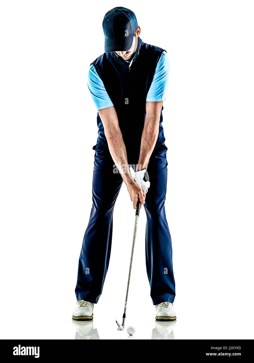 one caucasian man golfer golfing in studio isolated on white background ...