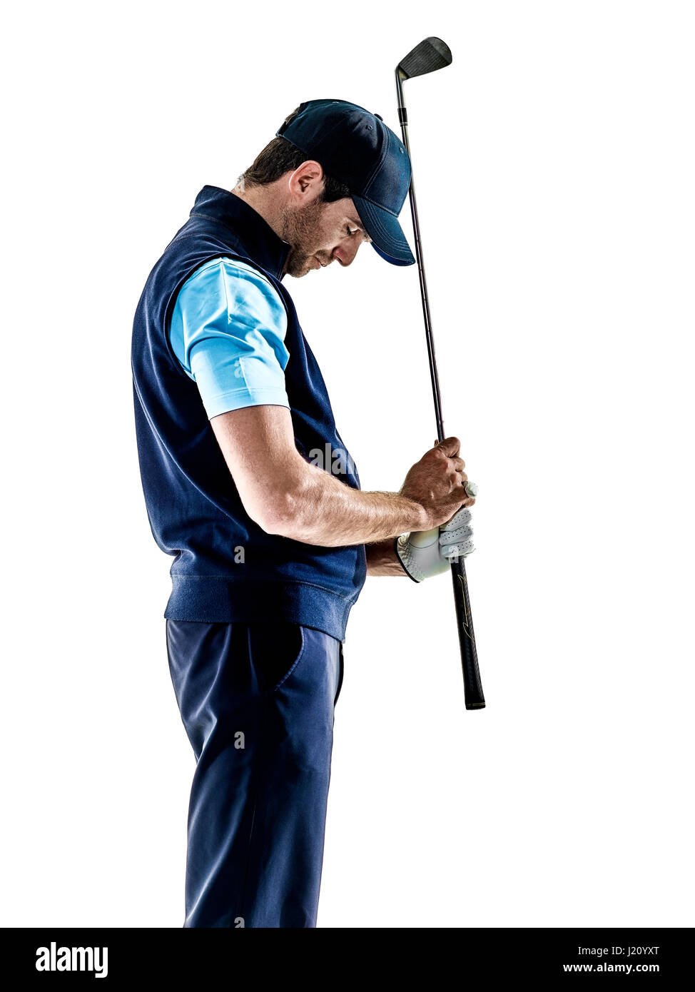one caucasian man golfer golfing in studio isolated on white background ...
