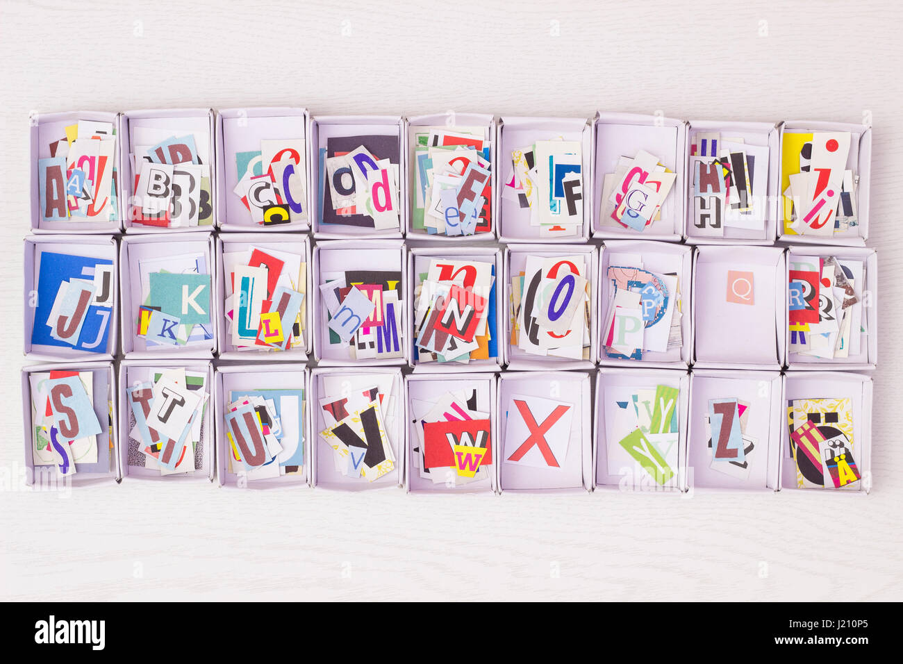 Alphabet in cut paper hi-res stock photography and images - Alamy