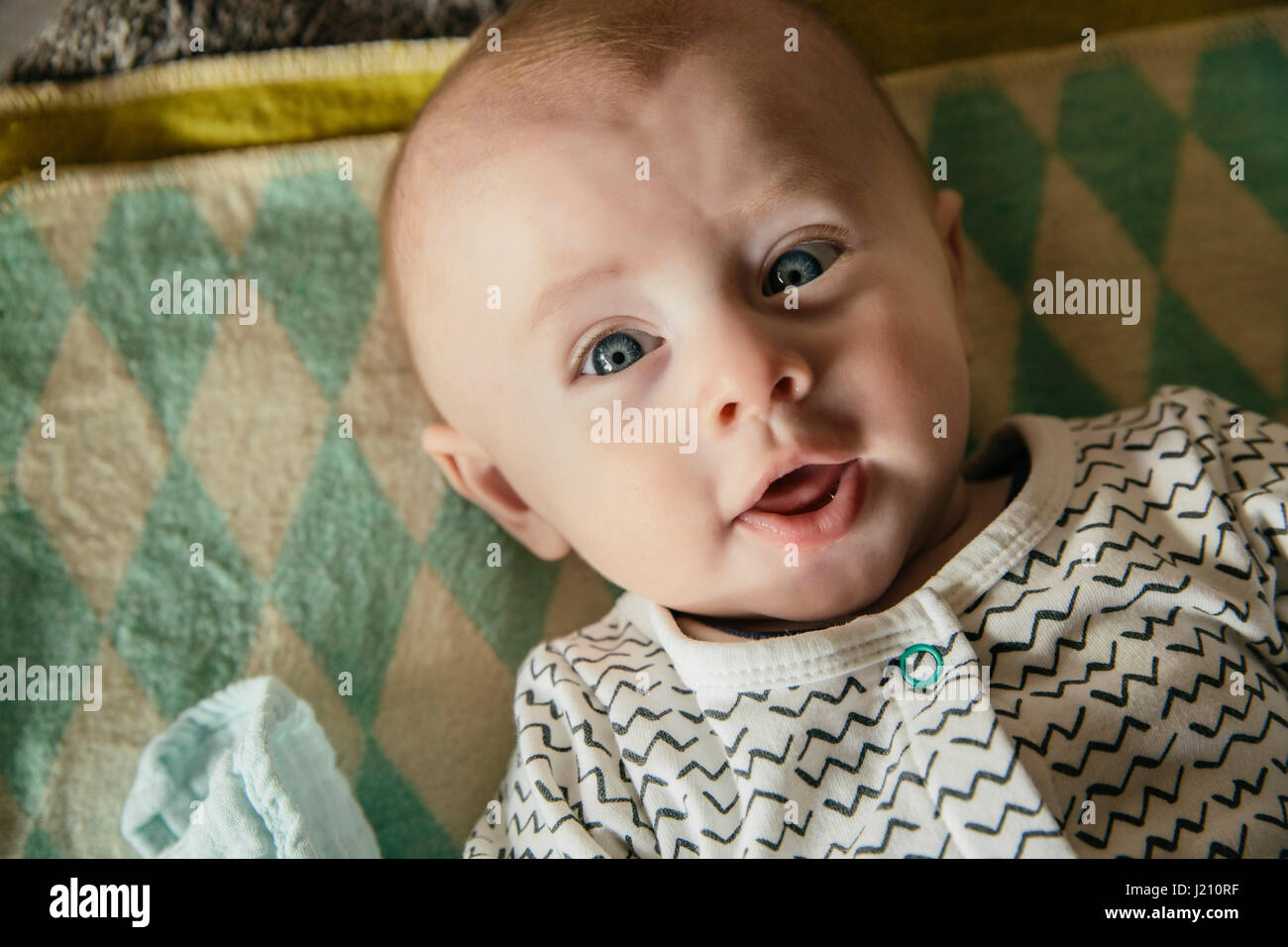 Happy baby face as seen from above Stock Photo - Alamy