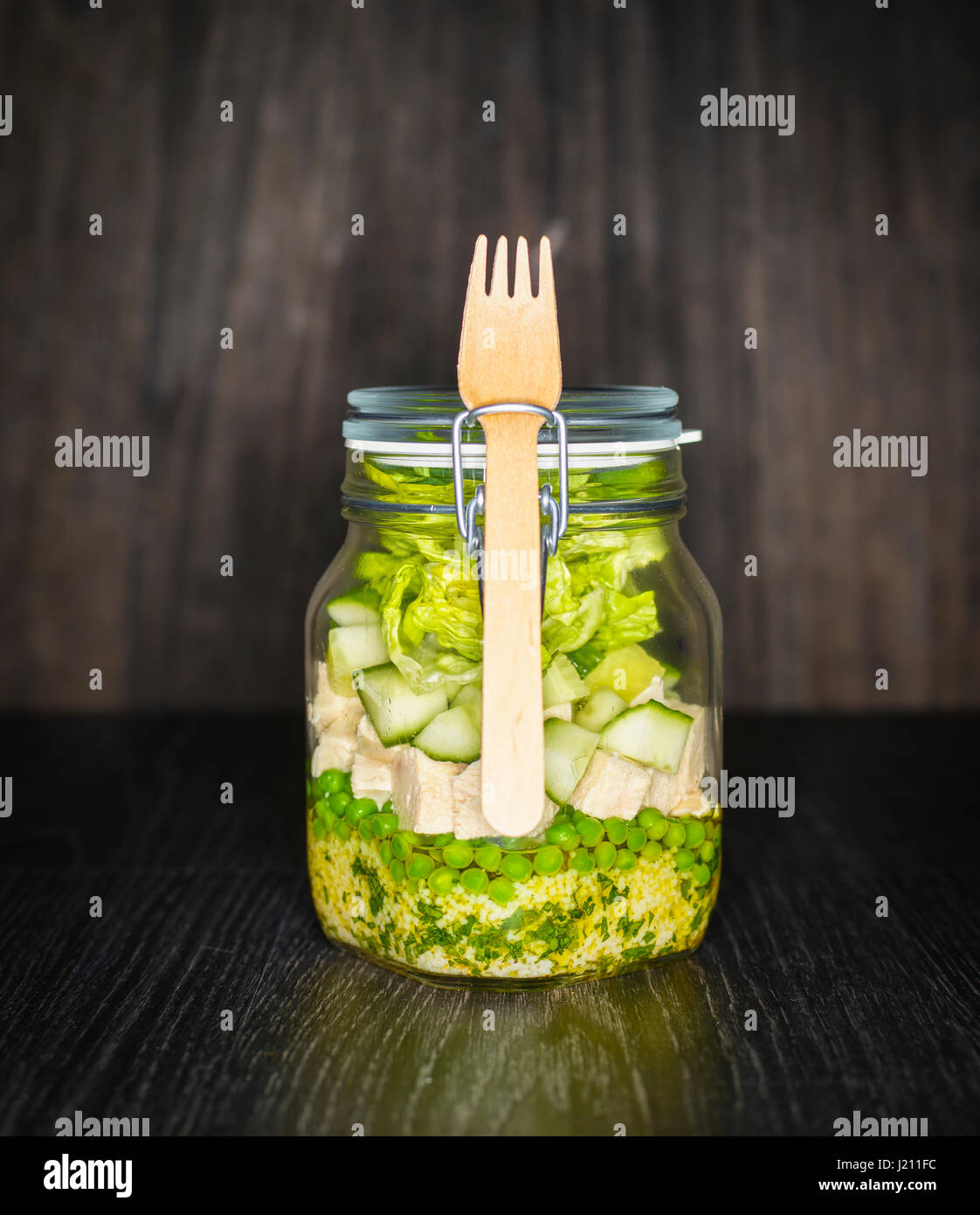 Preserving jar of mixed salad with couscous and chicken meat Stock ...