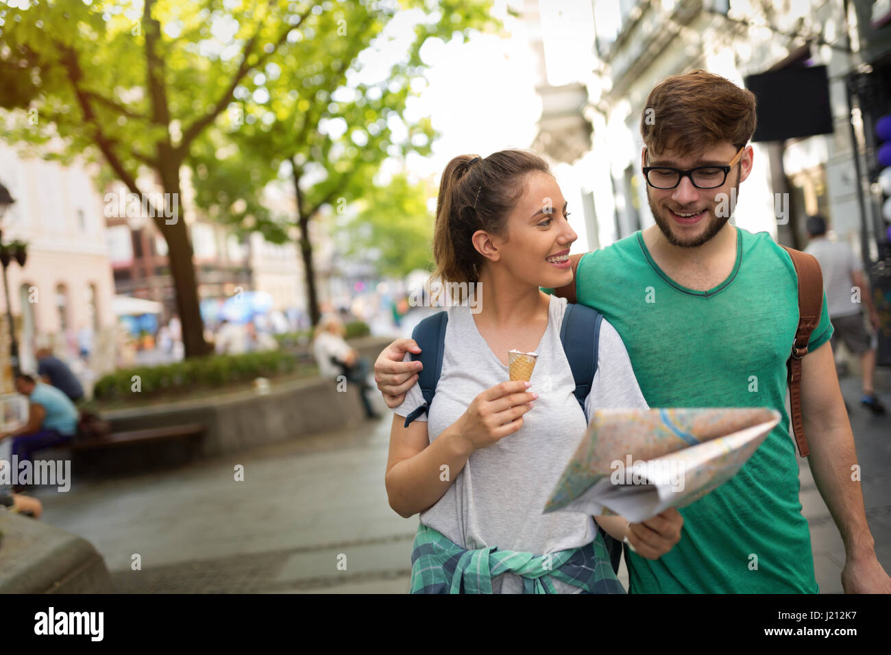 Happy young students on a travelling adventure Stock Photo - Alamy