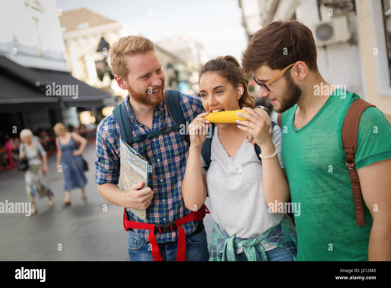 Young travelling people having fun and sightseeing in city Stock Photo ...