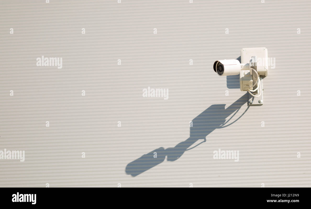 cctv motion sensor scurity cameras protecting property Stock Photo - Alamy
