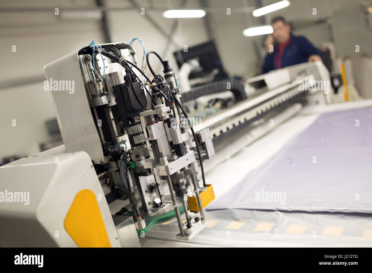 Spreading machine textile hi-res stock photography and images - Alamy