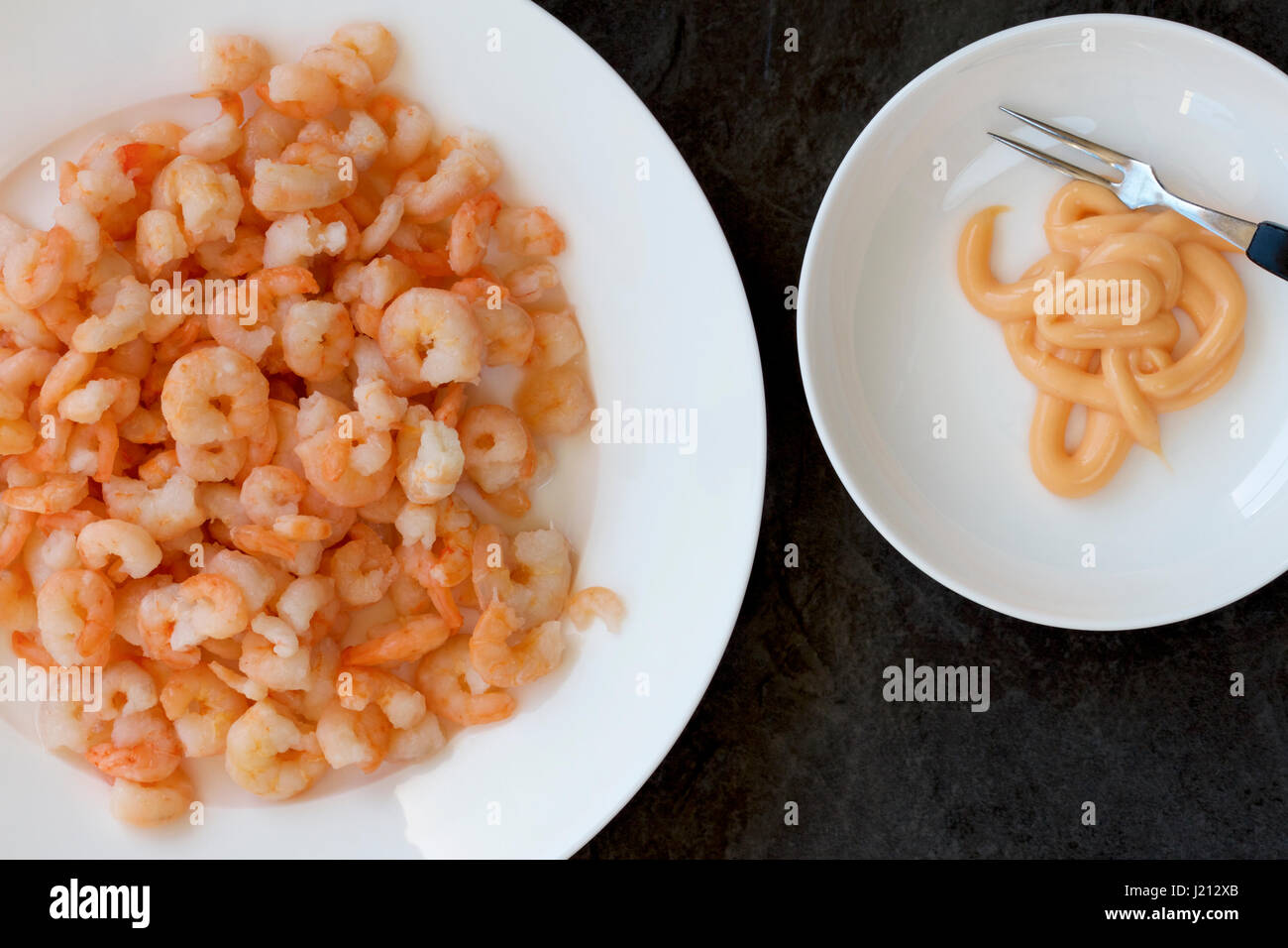 Plates of cooked prawns on a plate Stock Photo - Alamy