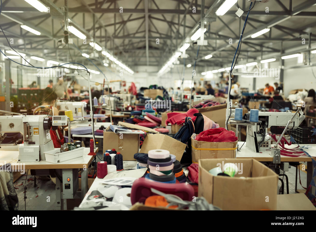 Industrial busy sewing workplace Stock Photo - Alamy