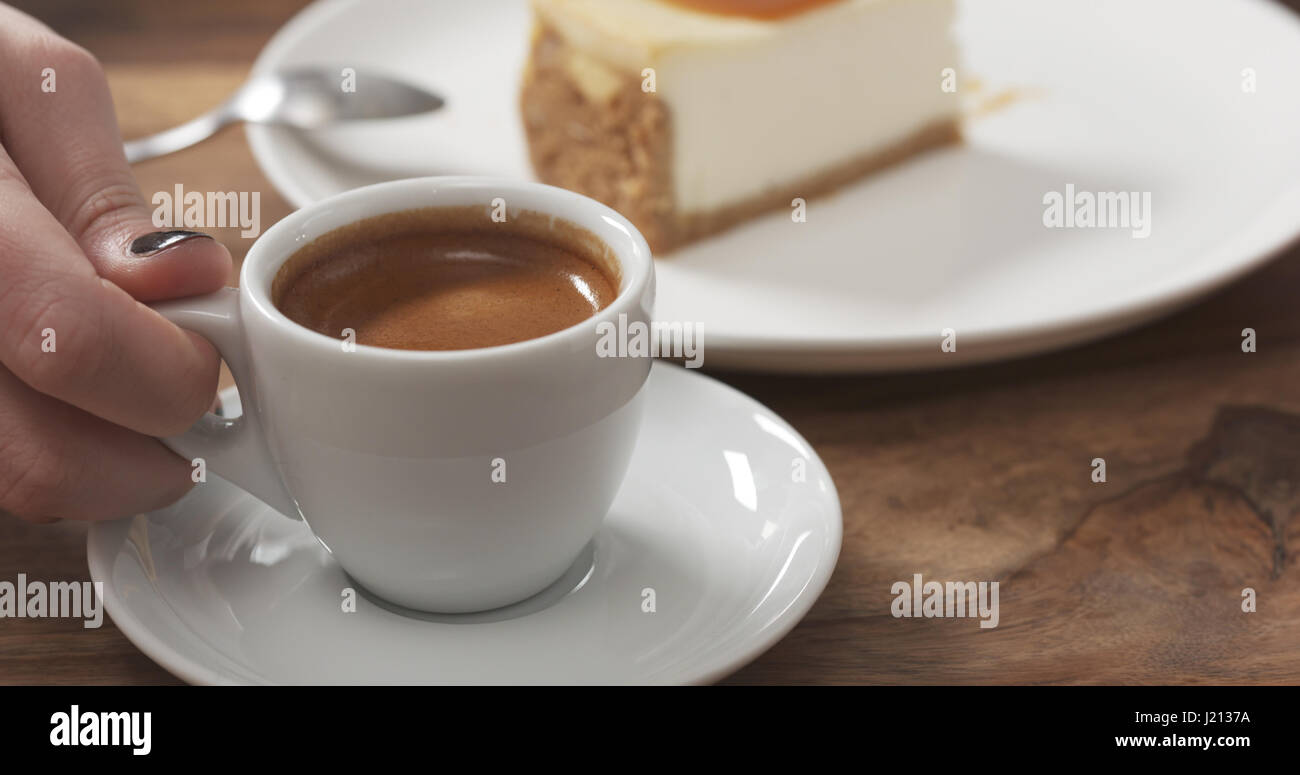 teenage girl eating cheesecake with caramel and drink coffee, 4k photo ...