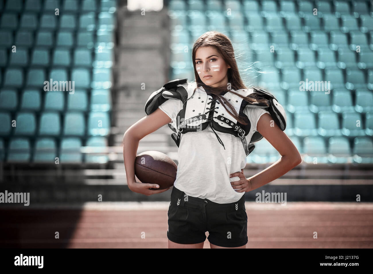 Rugby girl player stay with ball on stadion. Sport. Life Stock Photo ...