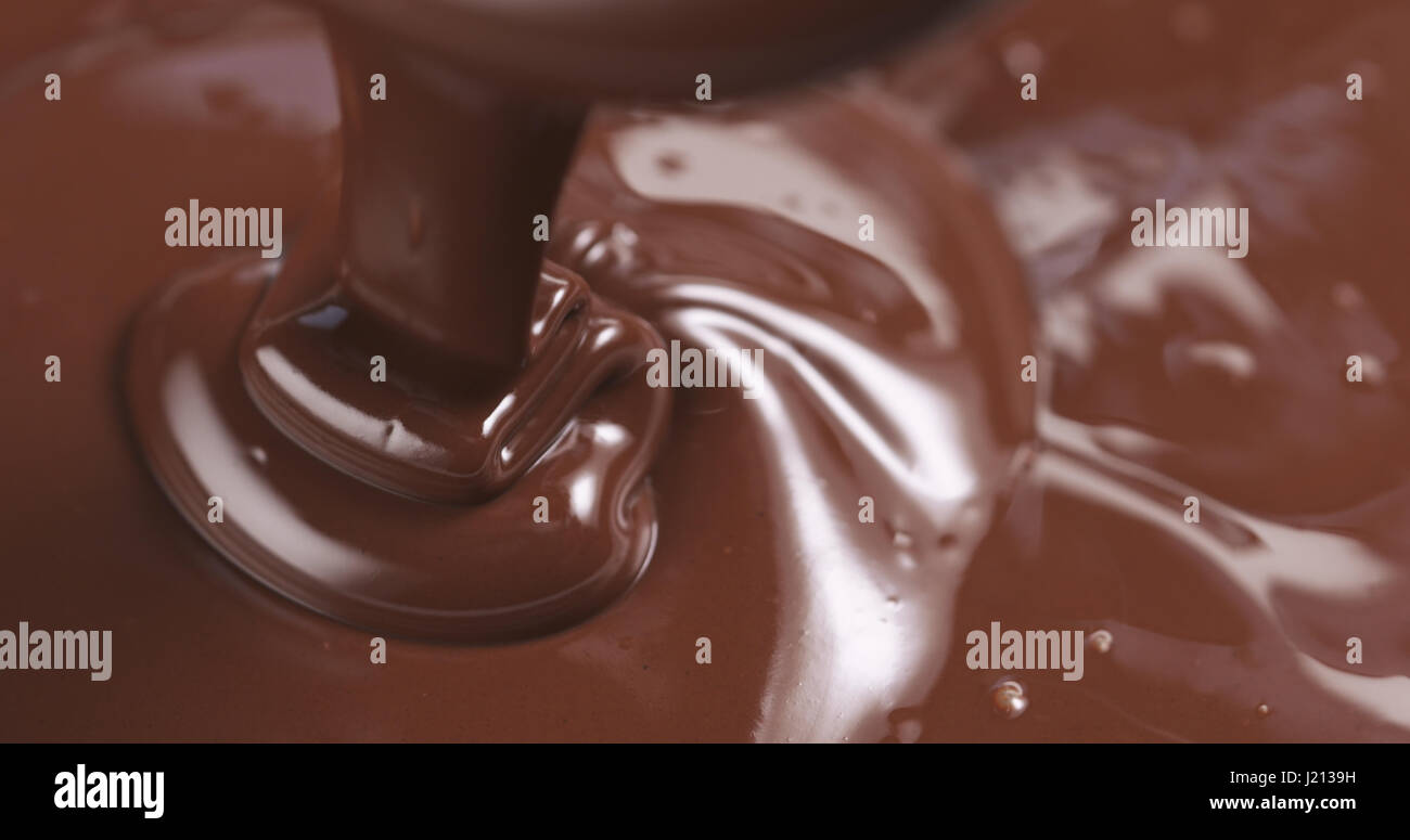 Melted chocolate background slow motion hi-res stock photography and ...