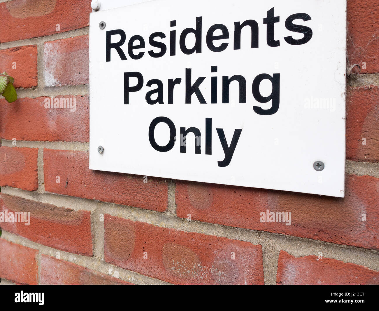 a sign outside near a private residential old people car park saying ...