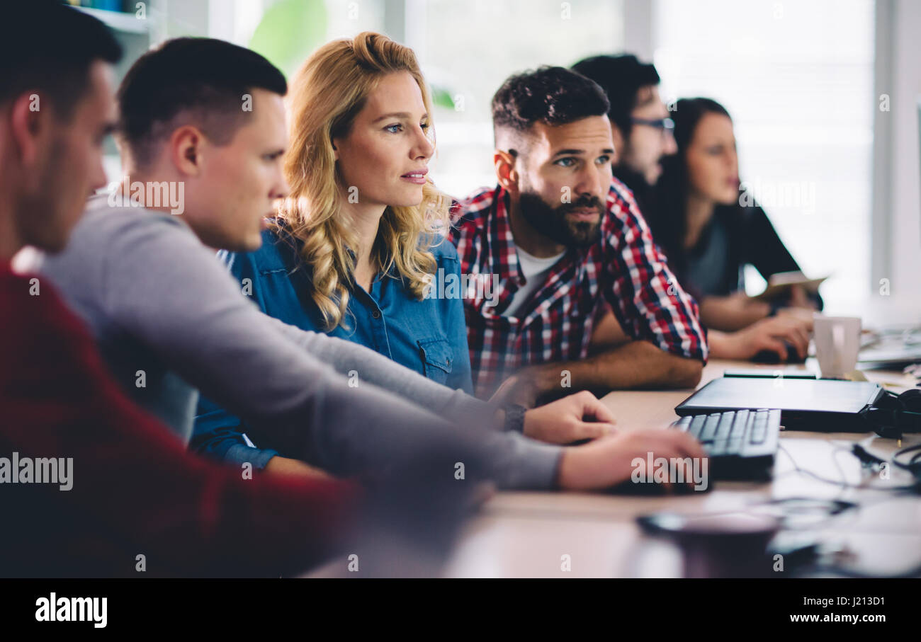 Business colleagues at information technology company offices Stock ...