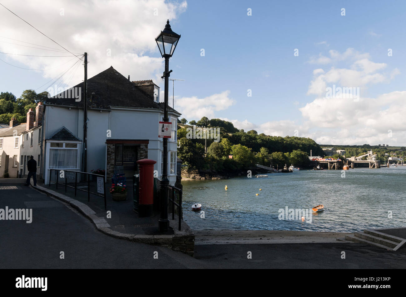 A jetty off Passage street in Fowey, Cornwall, Britain. Further up the ...