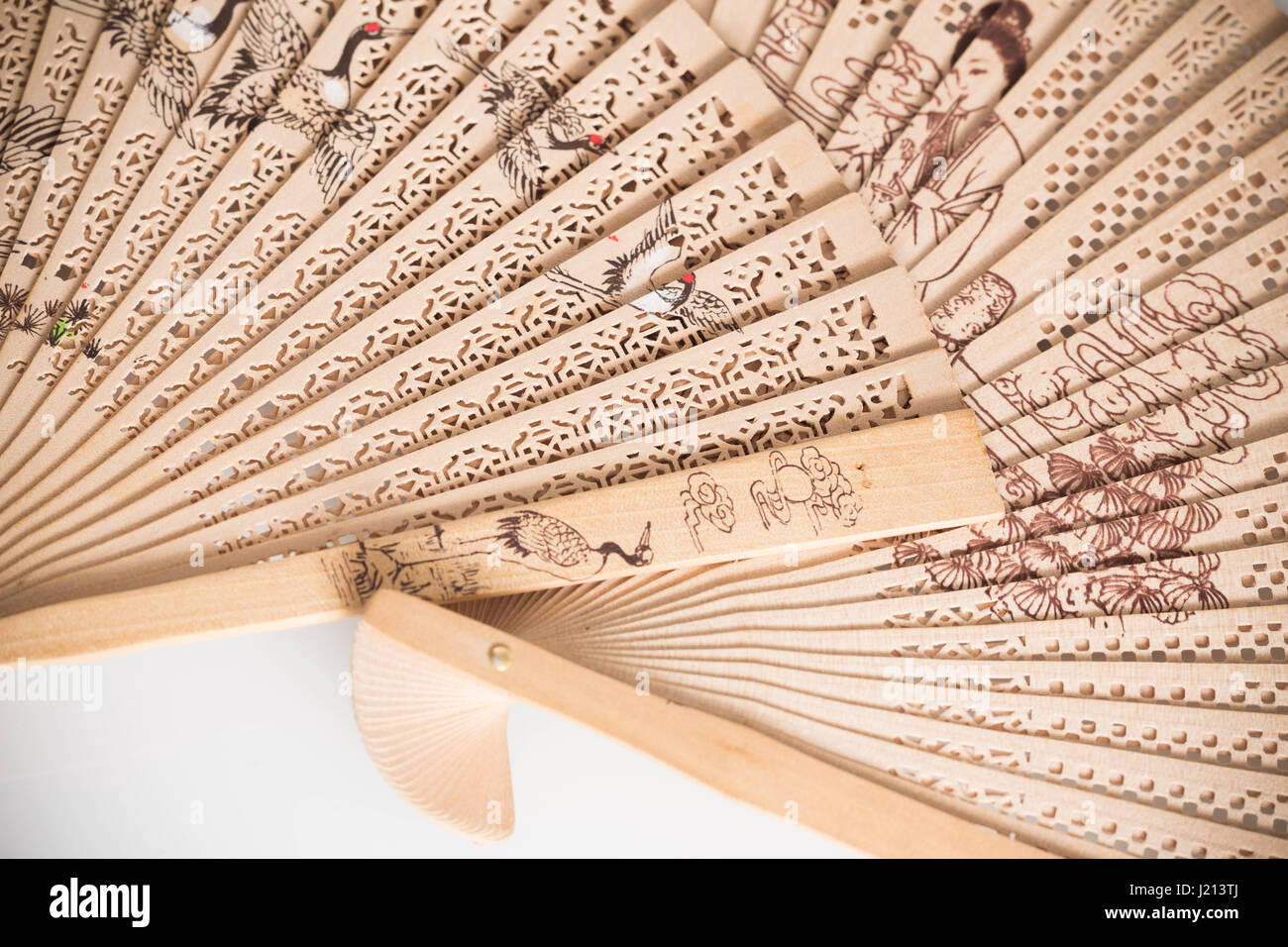 Wooden traditional japan fan Stock Photo - Alamy