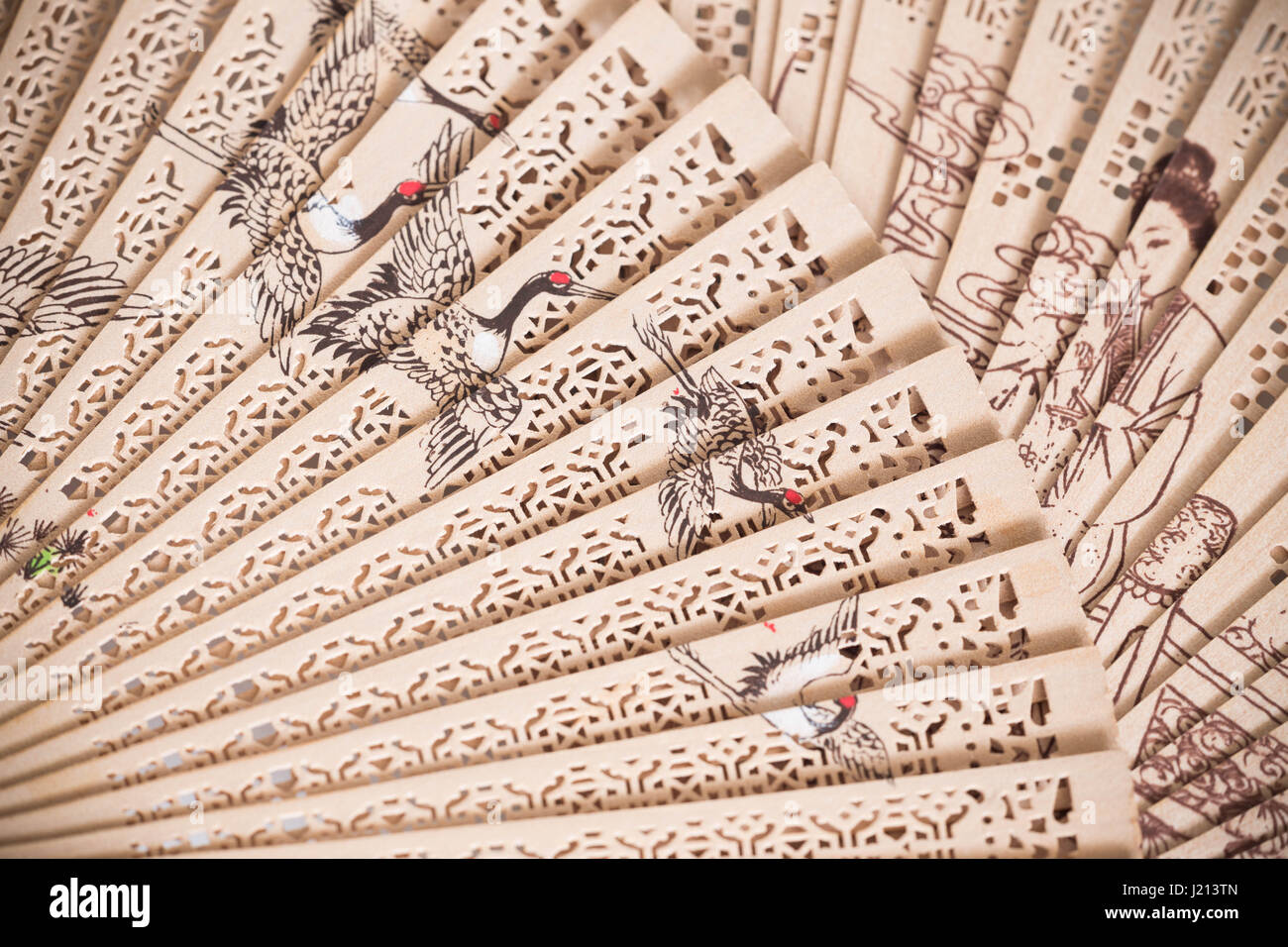 Wooden traditional japan fan Stock Photo - Alamy