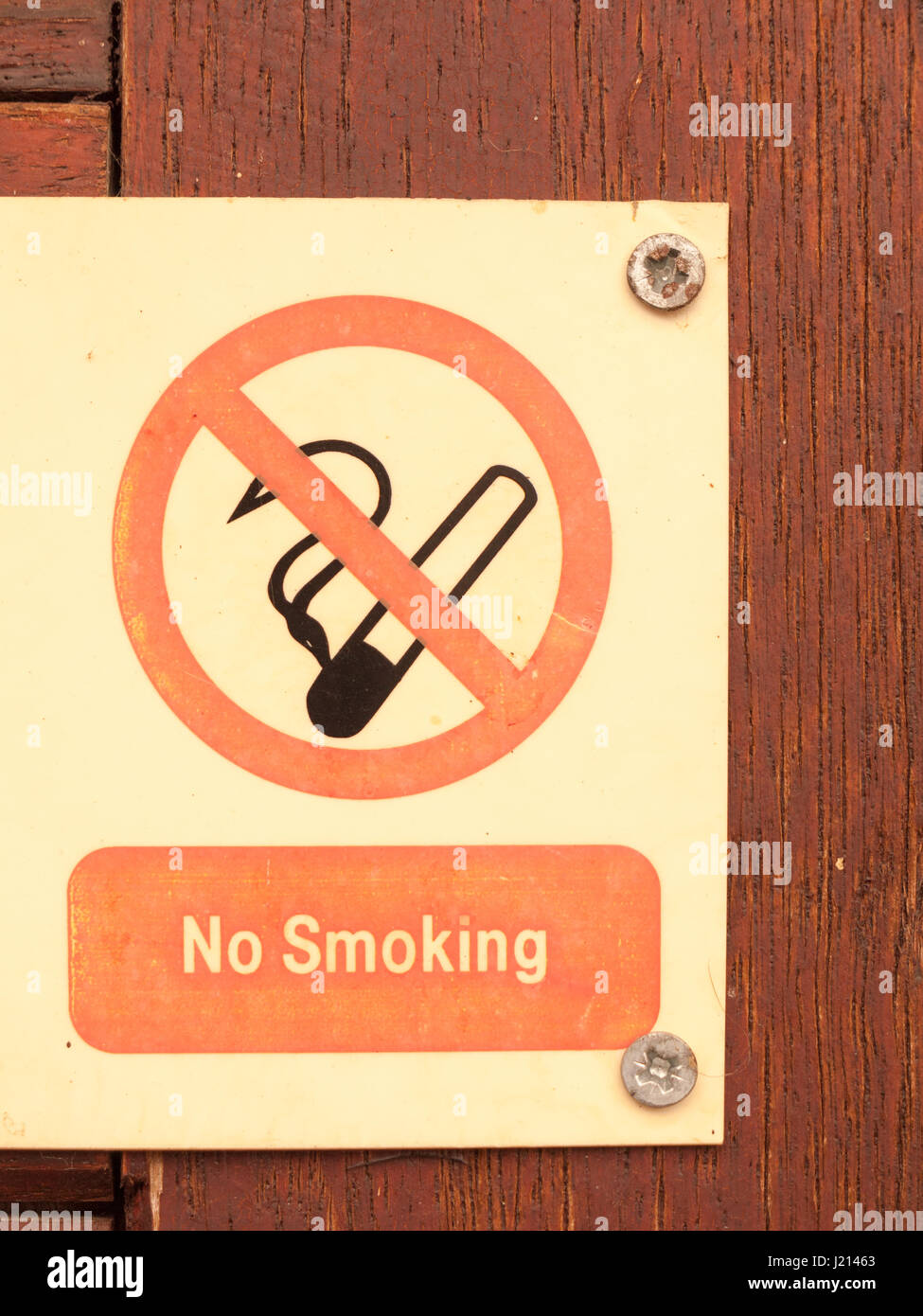 a nailed and screwed down sign red and black and white saying no ...