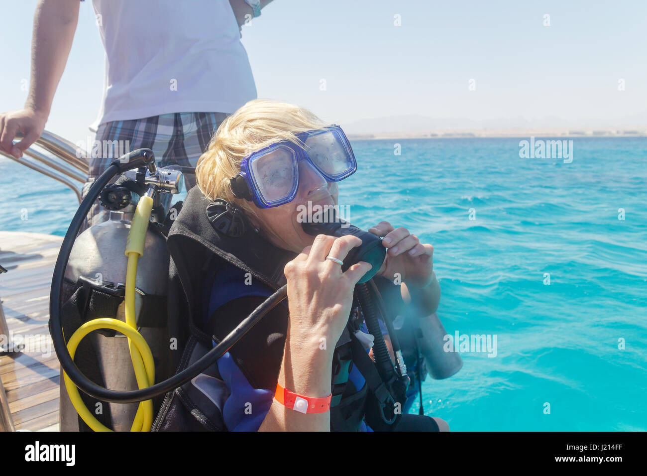 Woman with diving equipment in a mask Stock Photo - Alamy