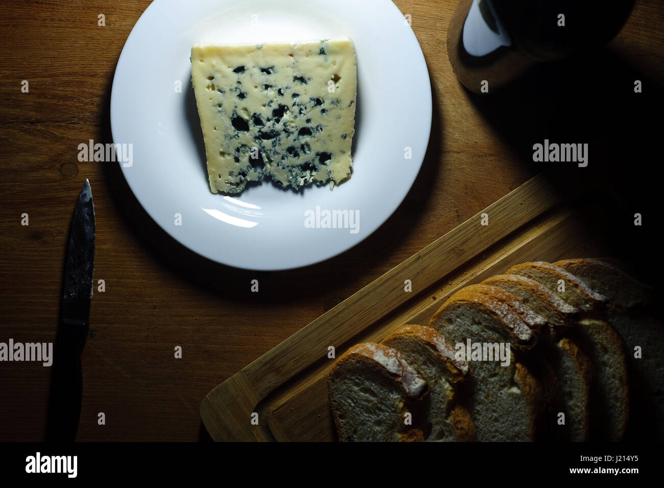 French cheese called Bleu des causses, bread and red wine Stock Photo ...