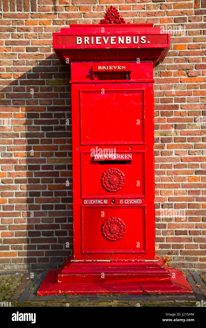 Ancient post box in Amsterdam, Netherlands Stock Photo - Alamy
