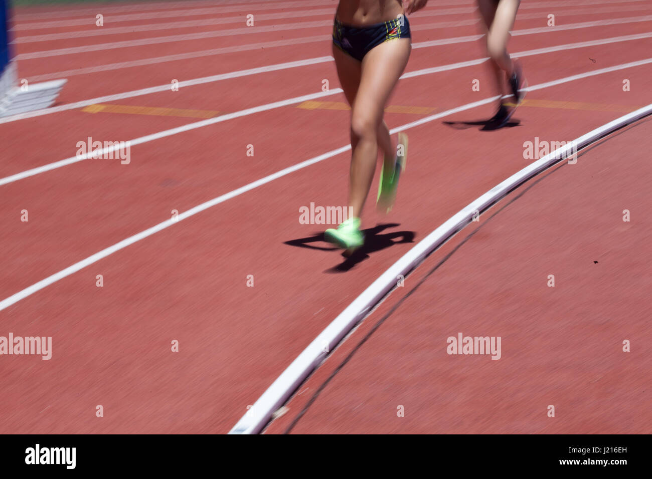young girls doing Hurdling on a the track and field stadium CIAT in ...
