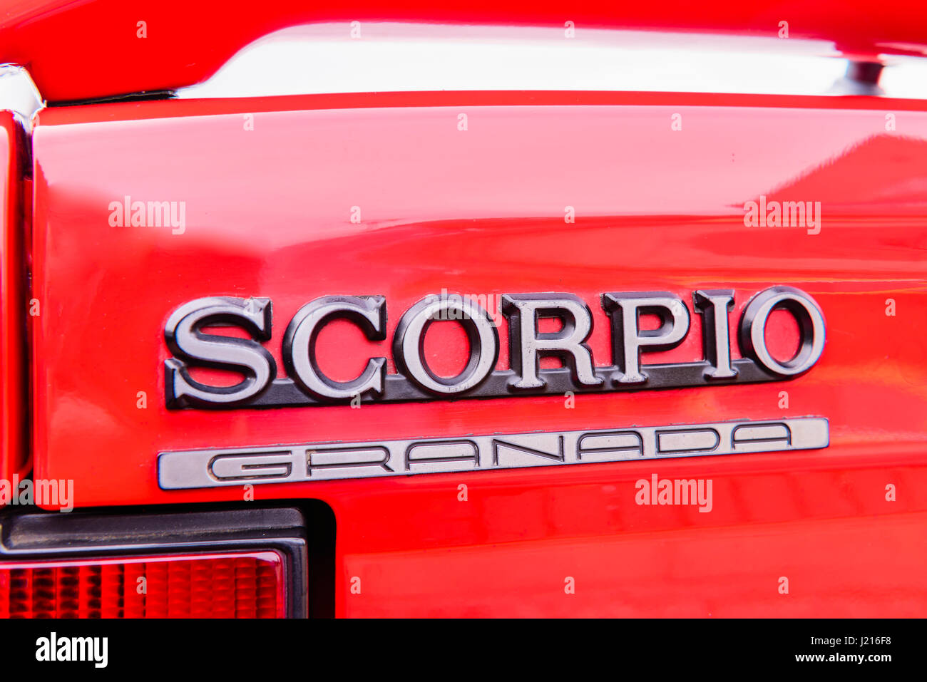 Rear badge of a red Ford Scorpio executive car produced by Ford Europe ...