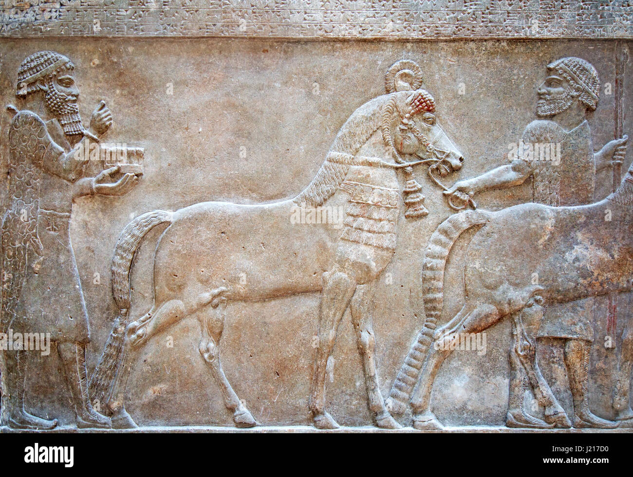 Ancient sumerian stone carving with cuneiform scripting Stock Photo - Alamy