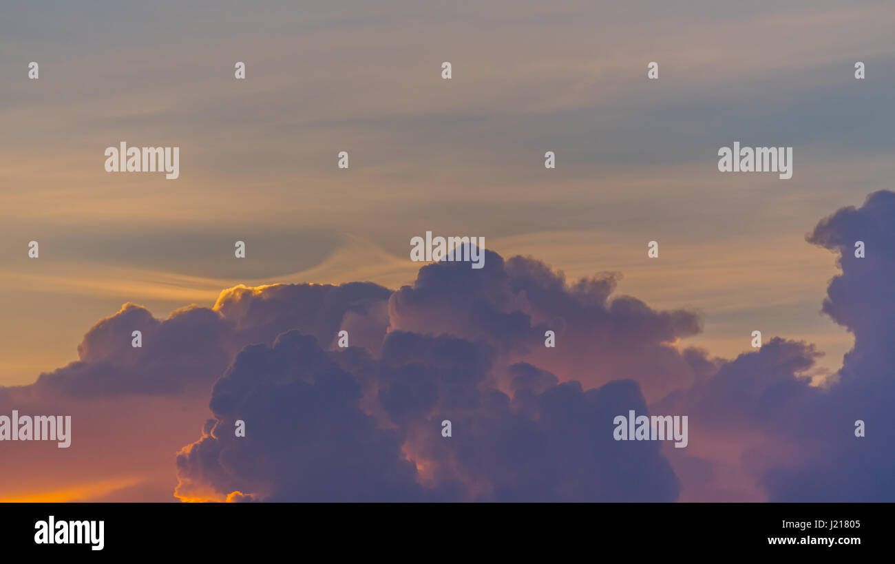 Colorful clouds at sunset Stock Photo - Alamy