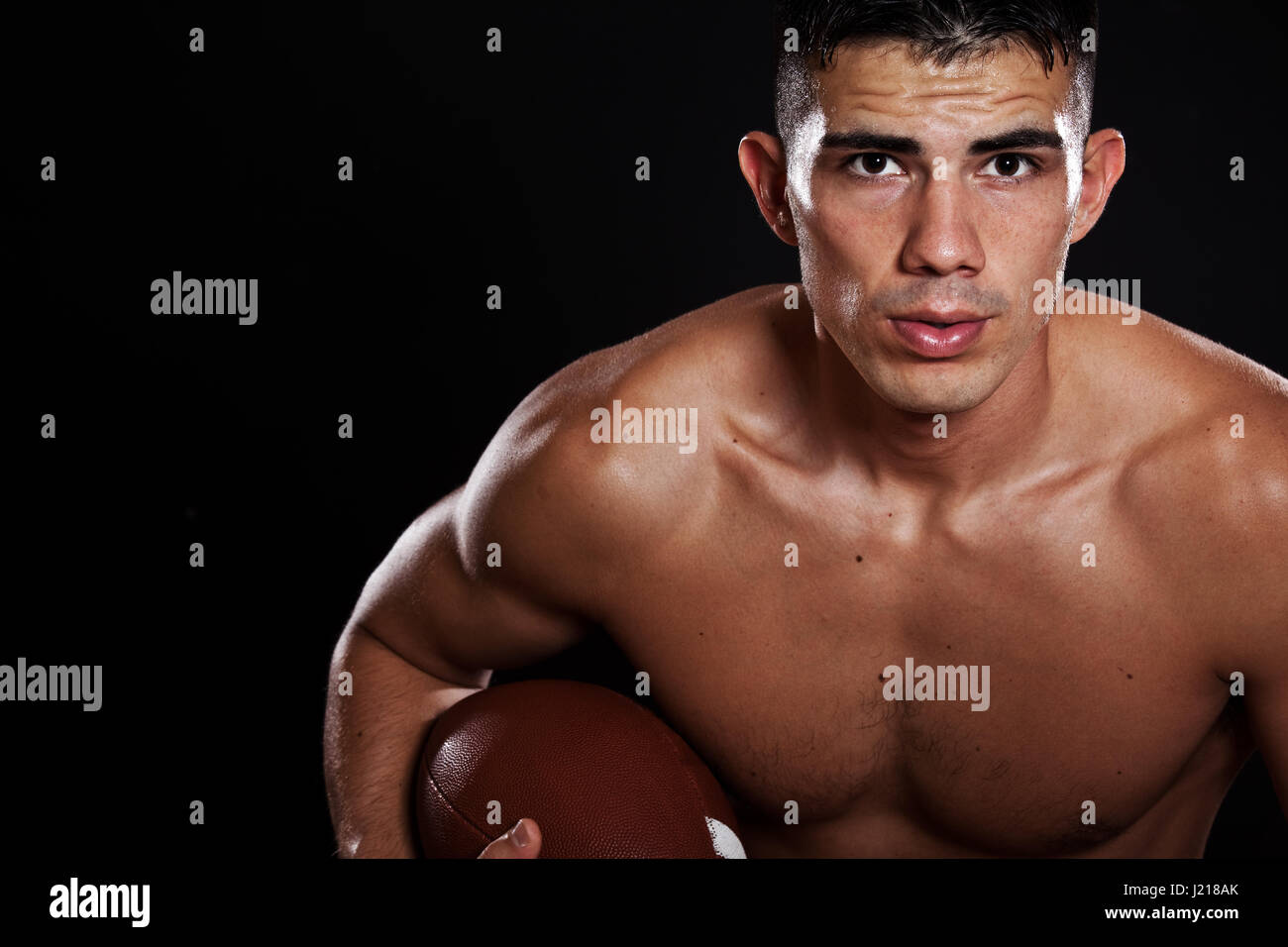 A portrait of a hispanic american football player Stock Photo - Alamy