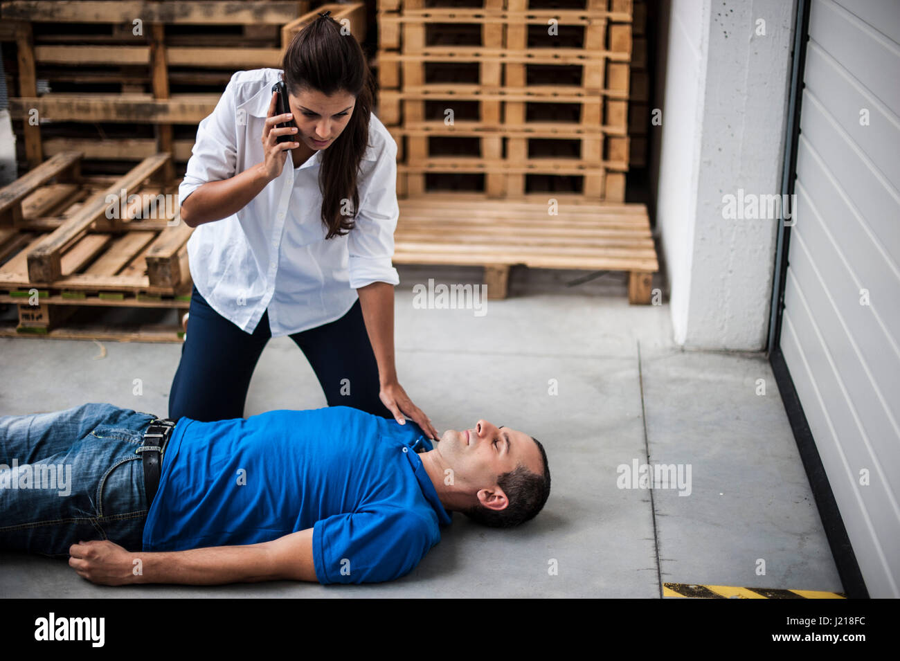 a girl helping a guy after heart attack with cardiopulmonary ...