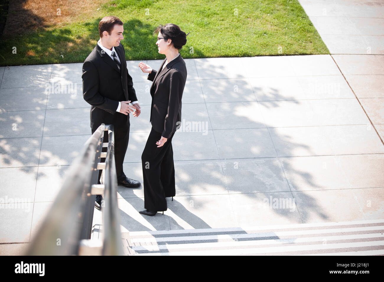 A shot of two business people having a discussion outdoor Stock Photo ...